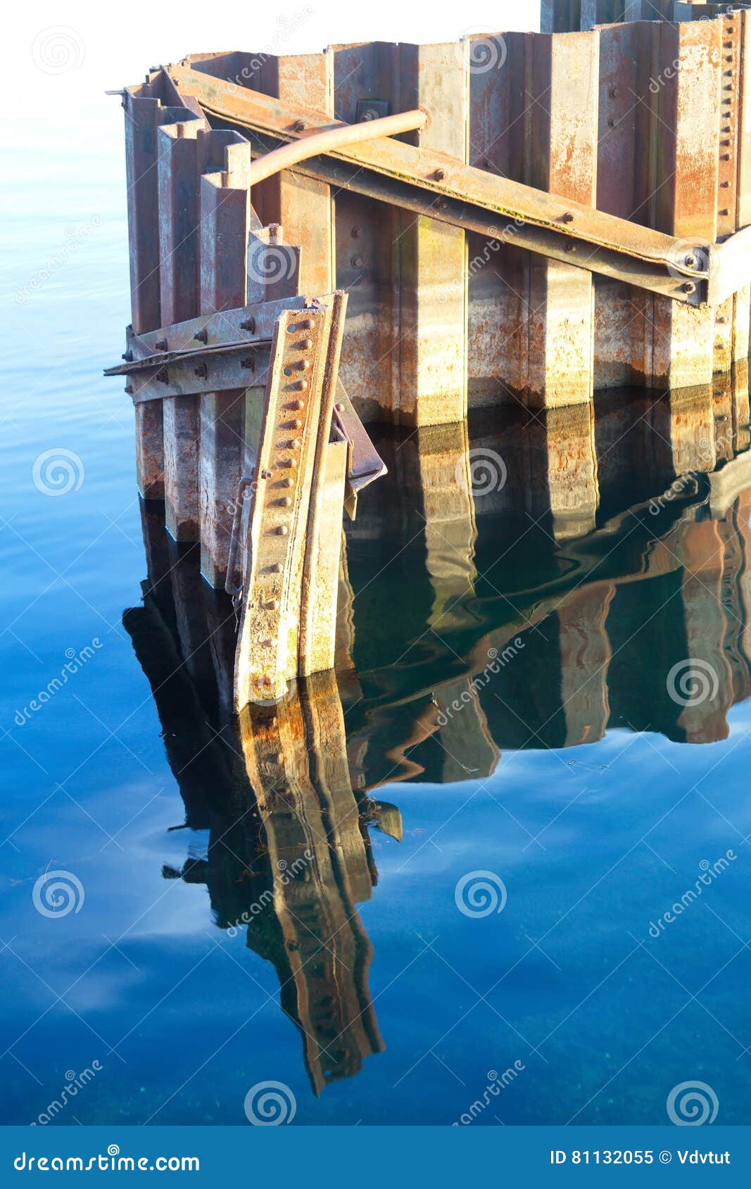Rusty Metal Barrier in Water Stock Image - Image of calm, dock: 81132055