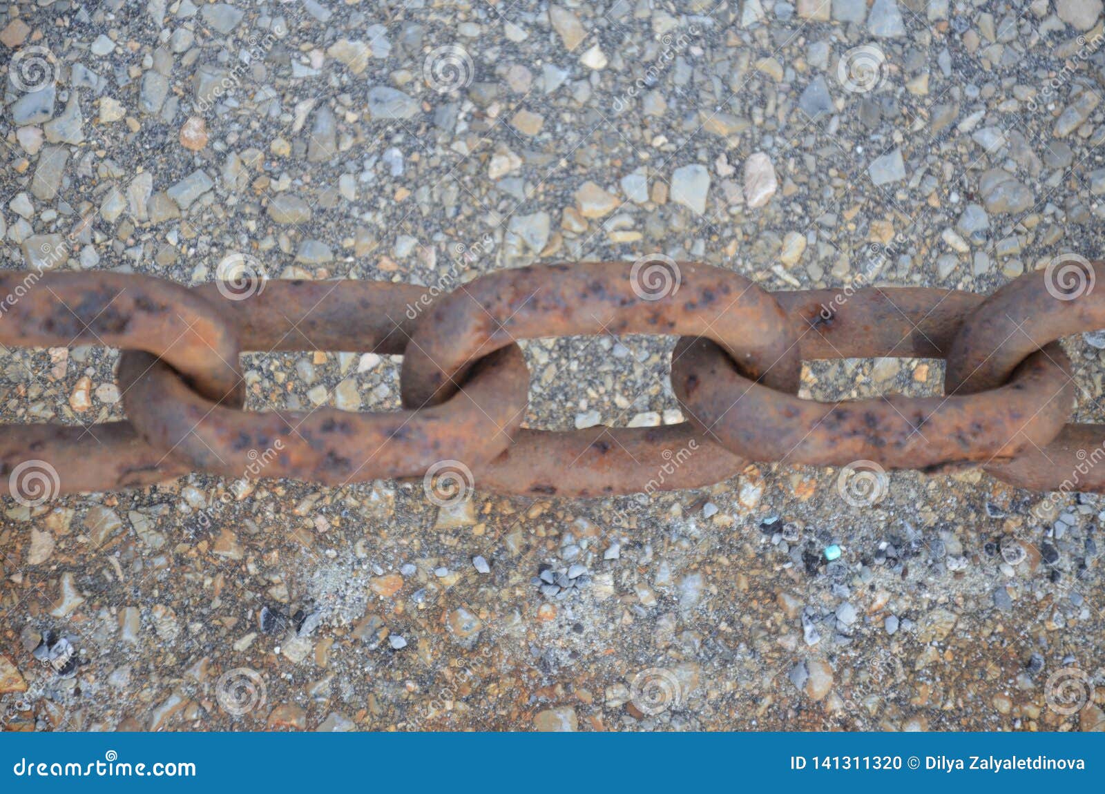 Rusty Metal Chains on the Background of Stones Stock Photo - Image of ...
