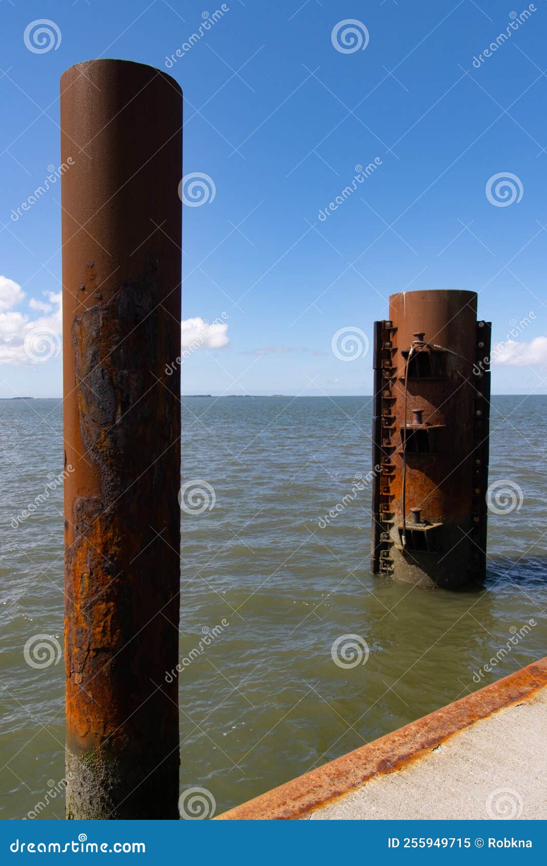 Rusty Metal Dolphin or Mooring Post in a Harbor Stock Image - Image of ...