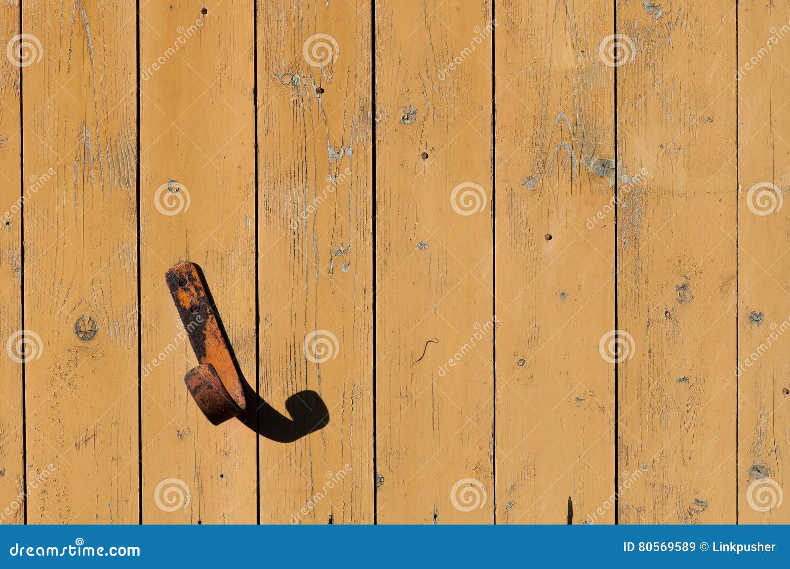 Rusty Metal Hook on the Wall from Boards Background Stock Image - Image ...