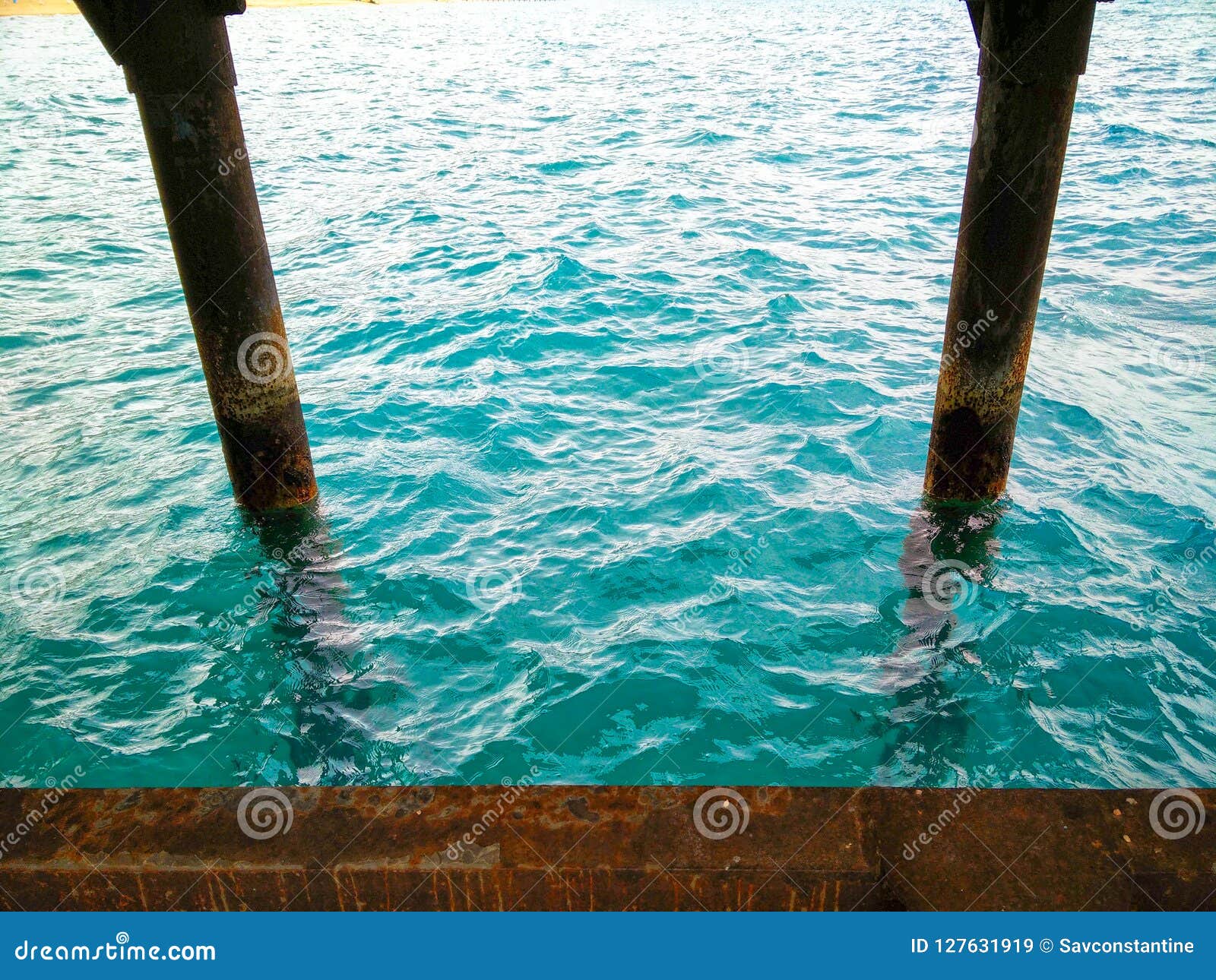 Rusty metal pier support. stock image. Image of tropical - 127631919