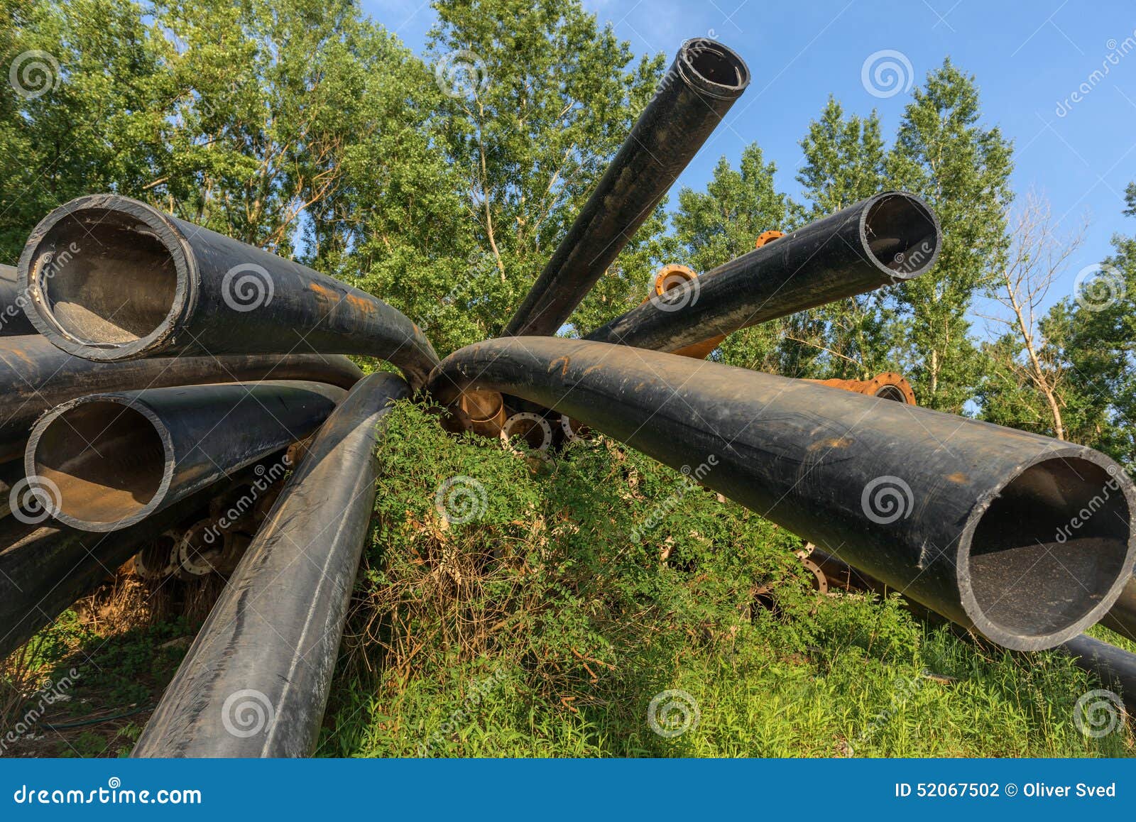 Rusty Metal Pipes in the Forest Stock Photo - Image of poison, ground ...