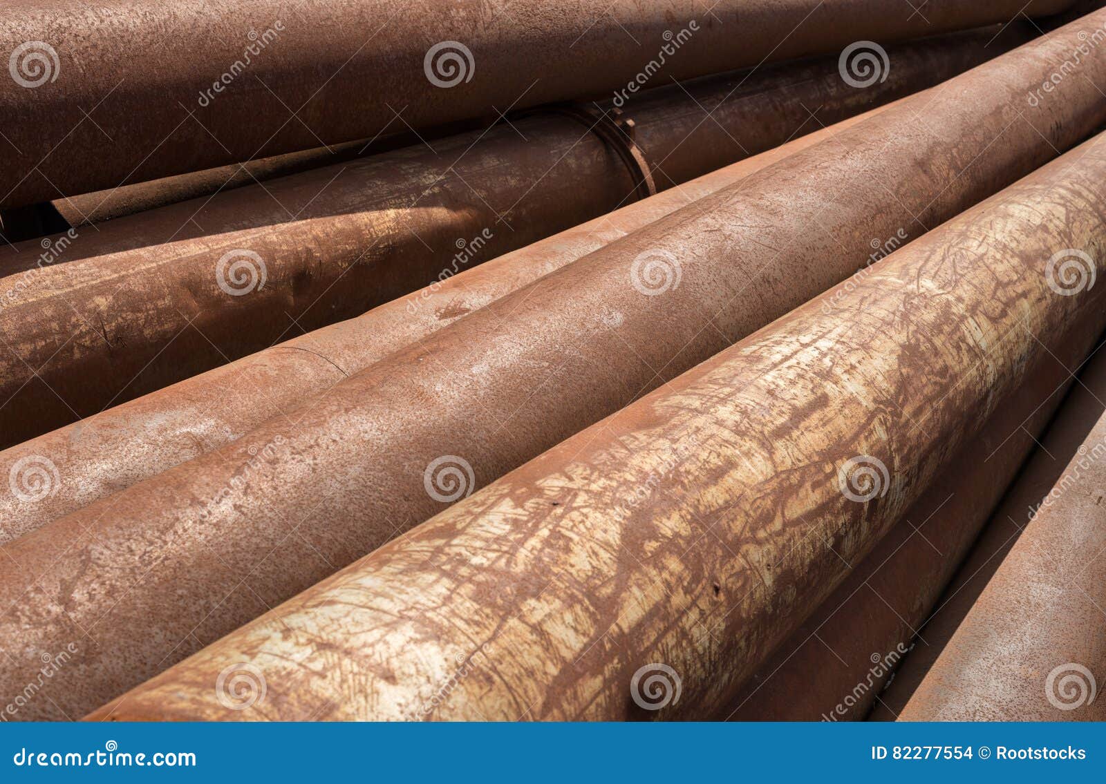 Rusty metal pipes stack stock photo. Image of corrosion - 82277554