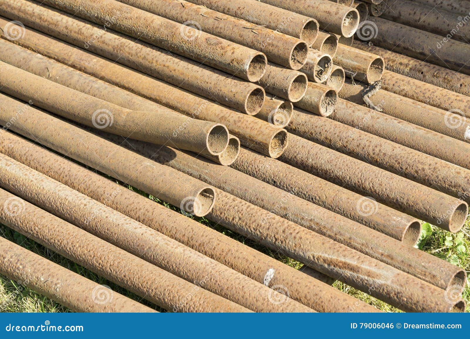 Rusty metal pipes stack stock photo. Image of piled, rust - 79006046