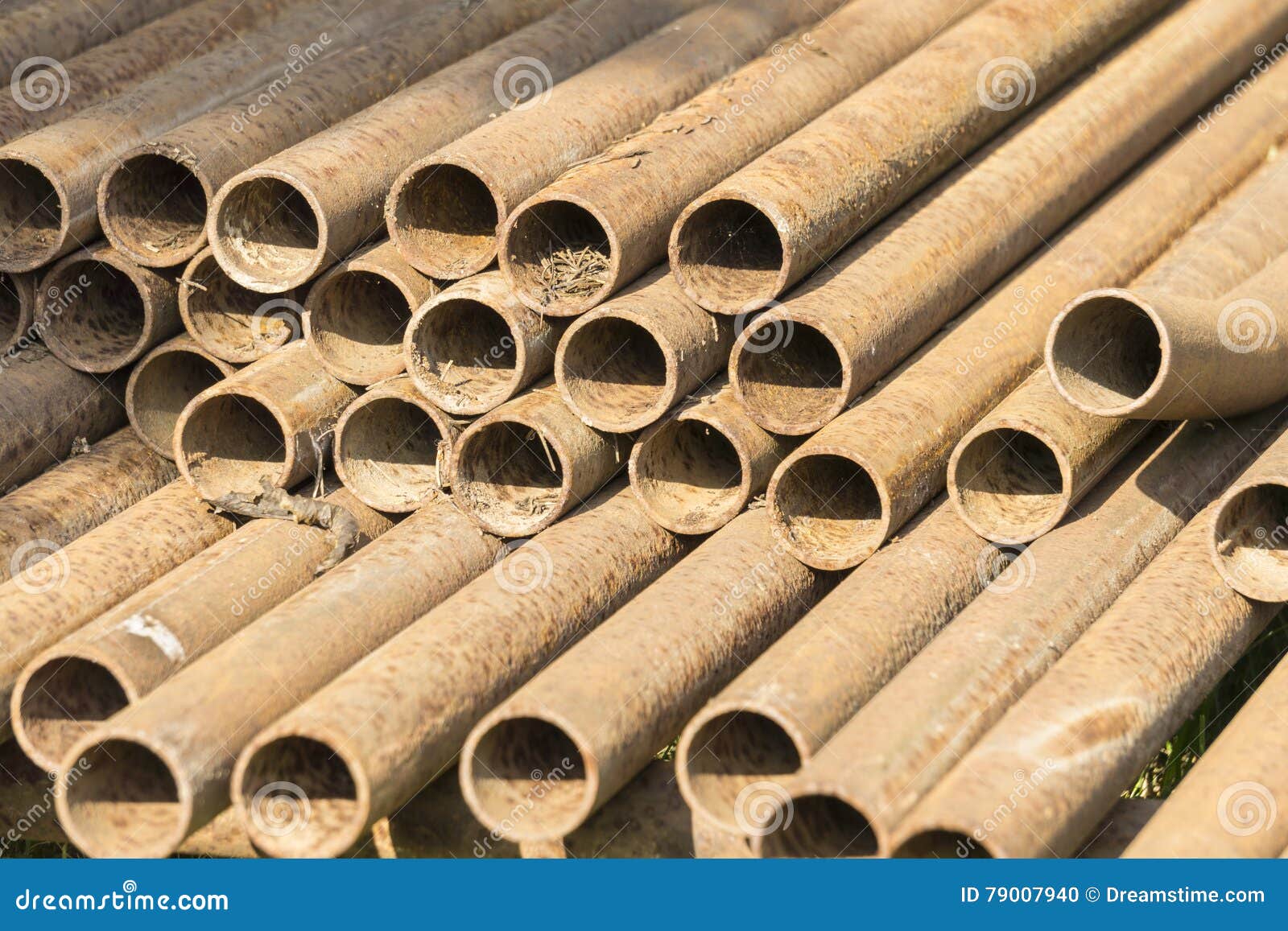 Rusty metal pipes stack stock photo. Image of metal, closeup - 79007940