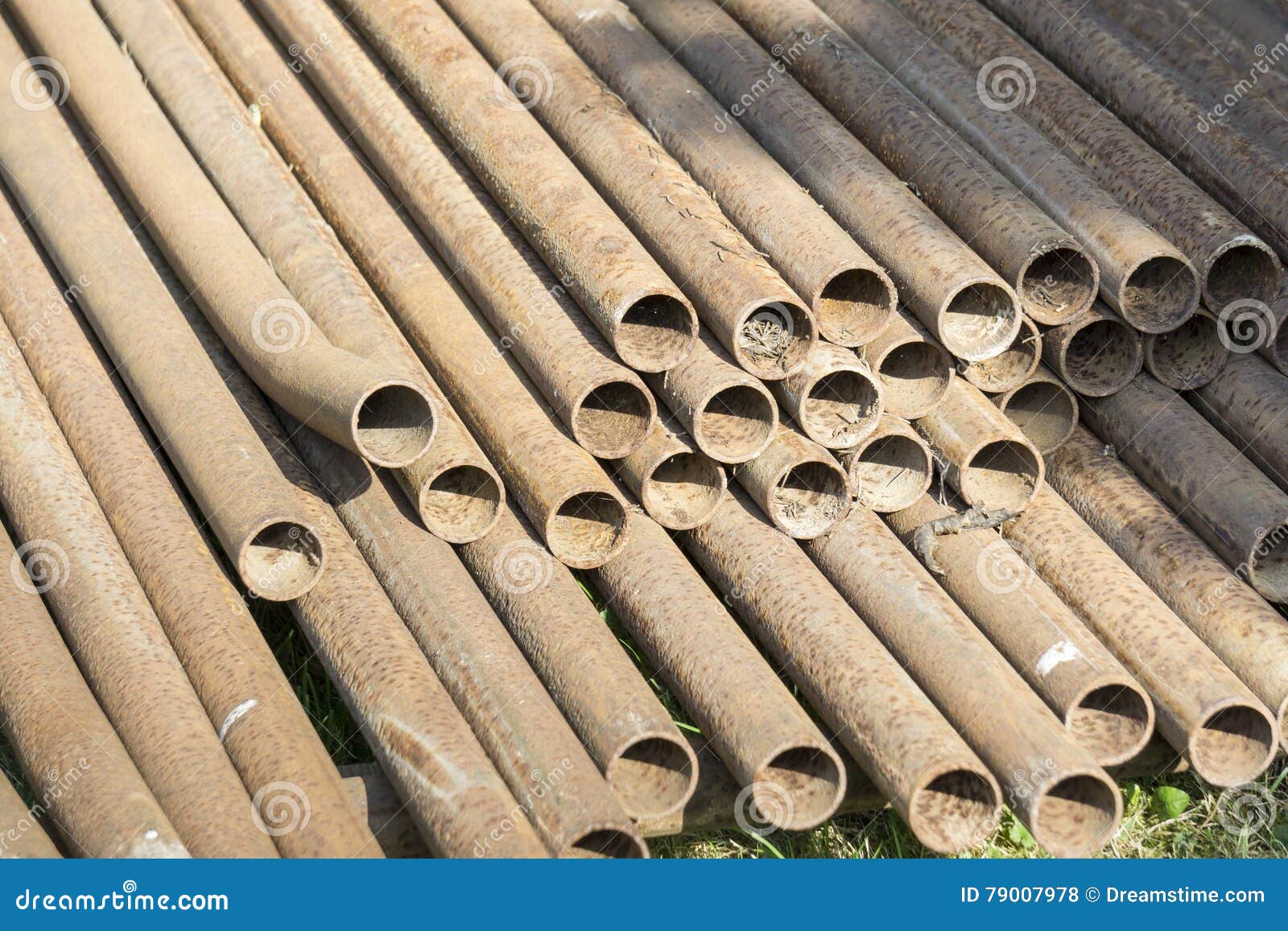 Rusty metal pipes stack stock photo. Image of horizontally - 79007978