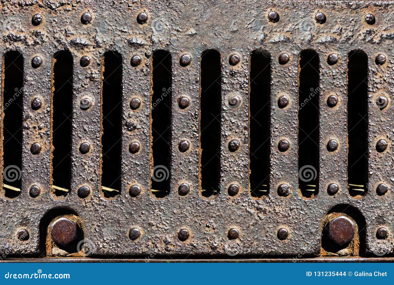 Rusty Metal Sewer Grate Close-up Stock Photo - Image of riveting ...