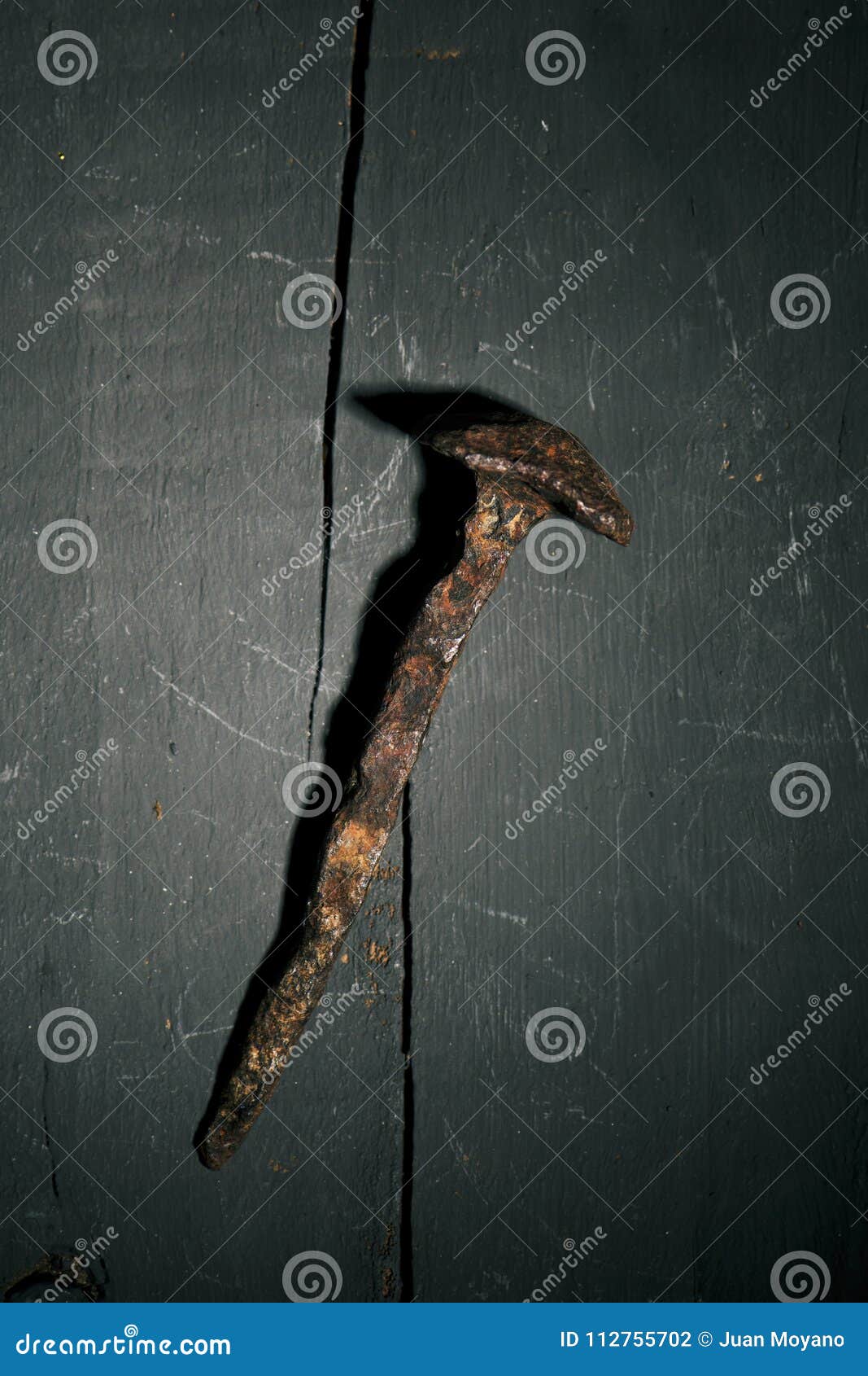 Rusty Nail on a Rustic Wooden Surface Stock Photo - Image of icon ...
