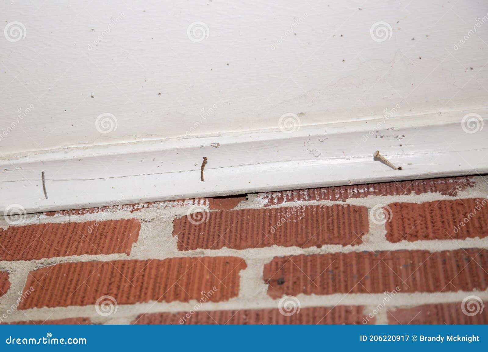 Rusty Nails Above Brick Wall Stock Image - Image of aged, brickwork ...
