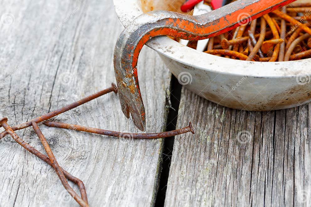 Rusty Nails and Nail Puller Stock Photo - Image of improvement ...