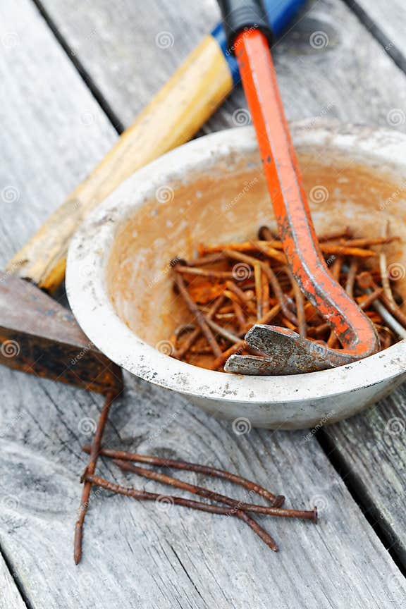 Rusty Nails and Nail Puller Stock Photo - Image of handyman, builder ...