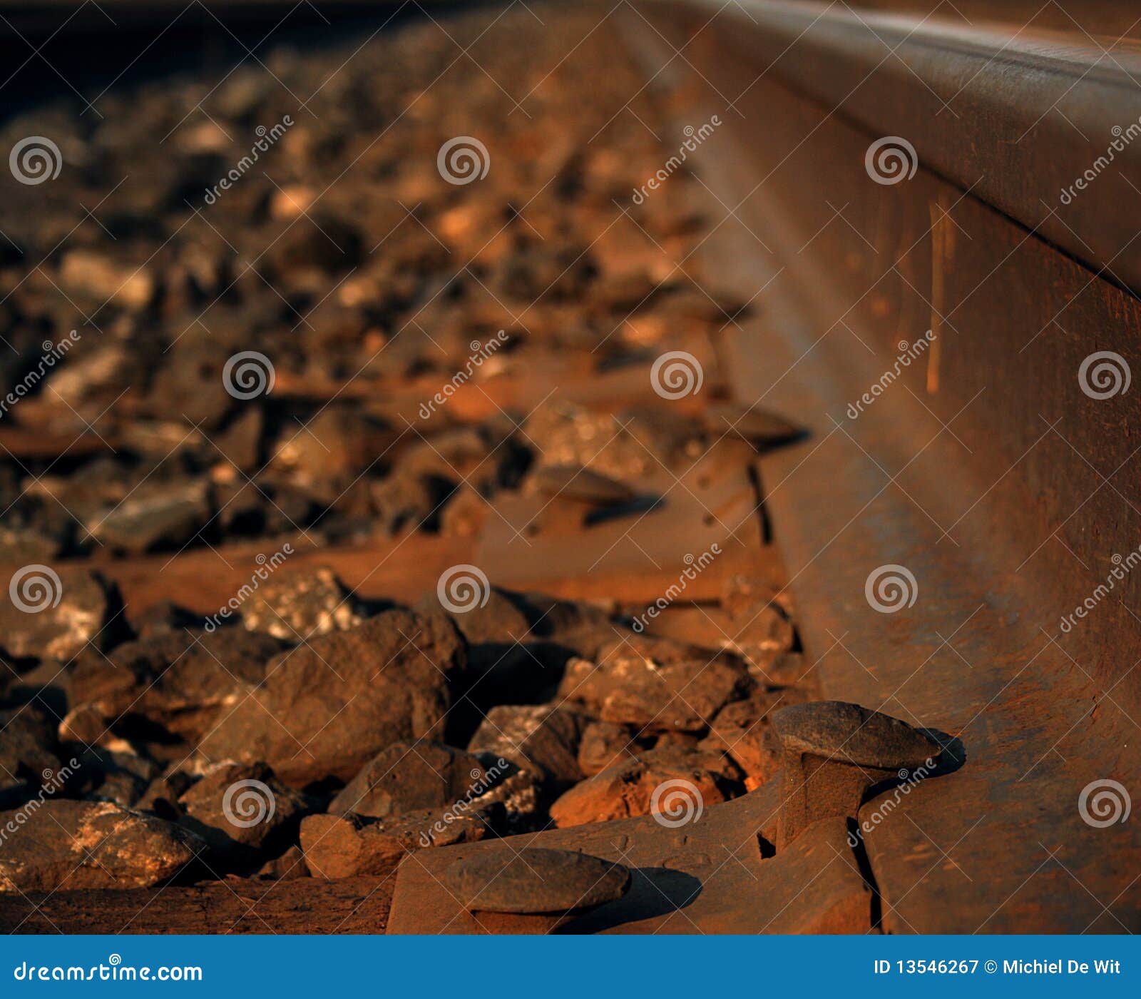 Rusty Nails on a Railroad Track Stock Image - Image of railroad ...