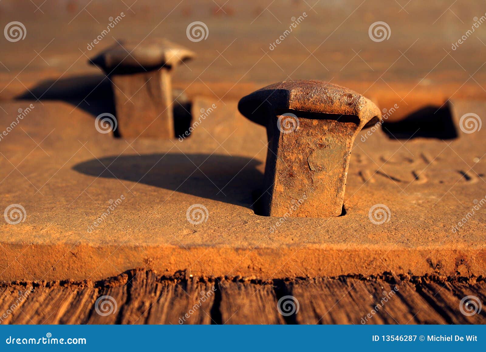 Rusty Nails on a Railroad Track Stock Image - Image of metal, rusty ...