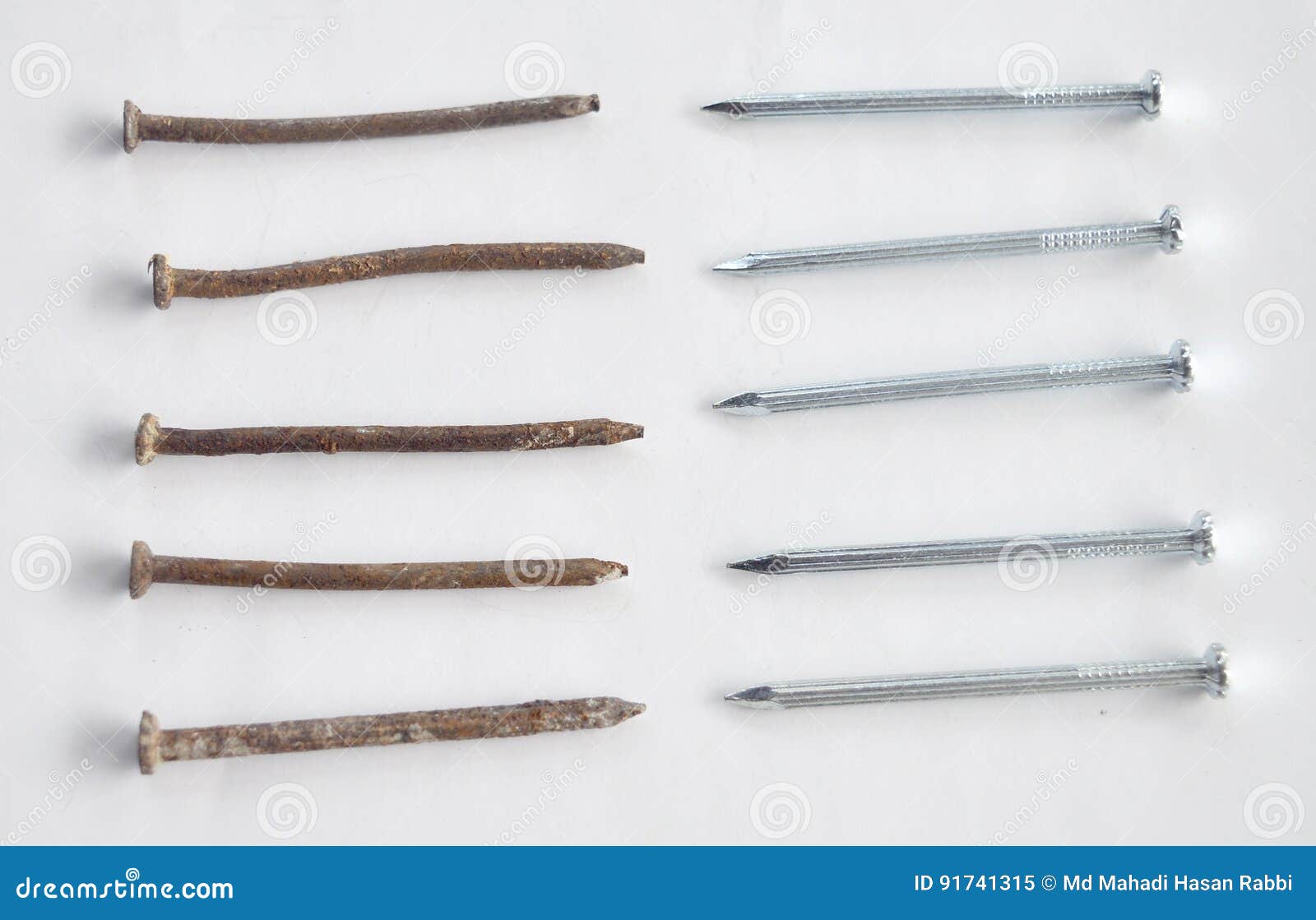 Rusty Nails vs New Nails stock image. Image of connect - 91741315