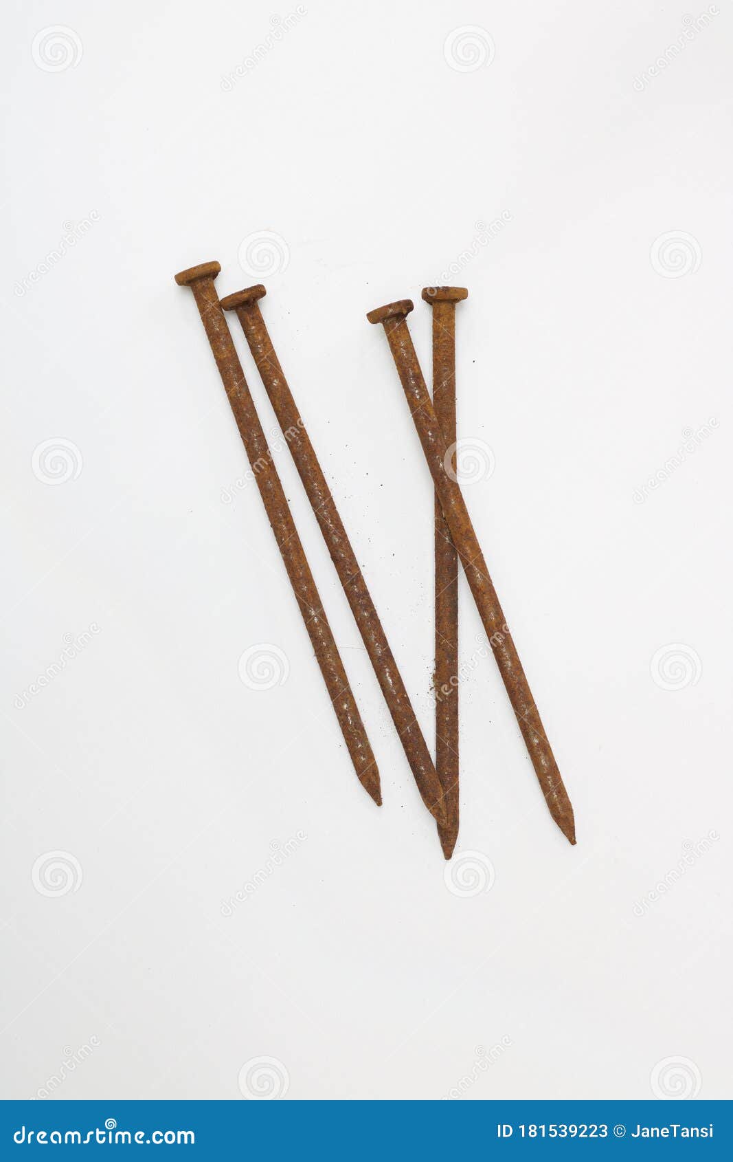 Group of Four Long Rusty Nails Against Plain White Background Stock ...