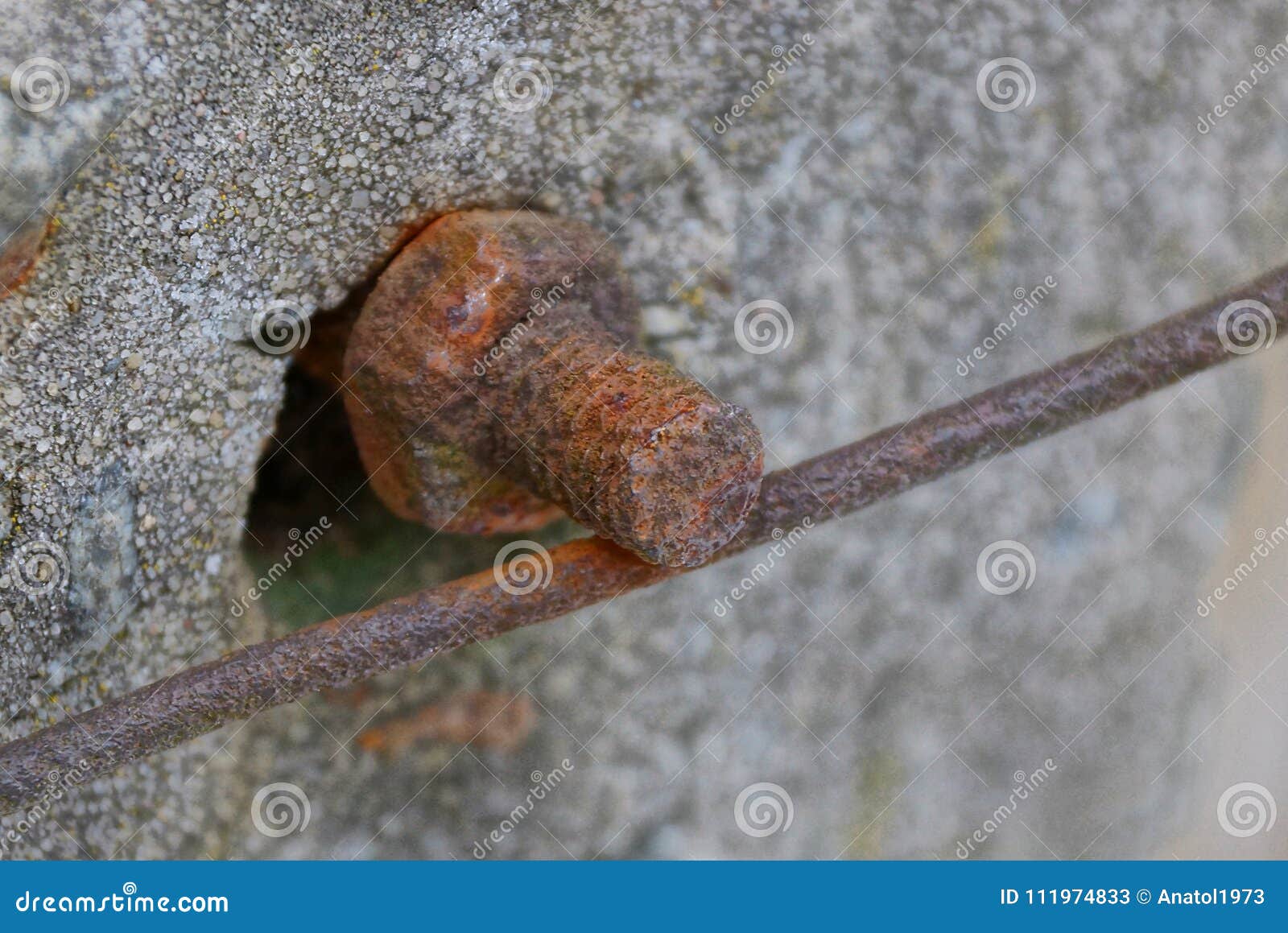 Rusty Nut and with Wire in a Concrete Wall Stock Image - Image of ...