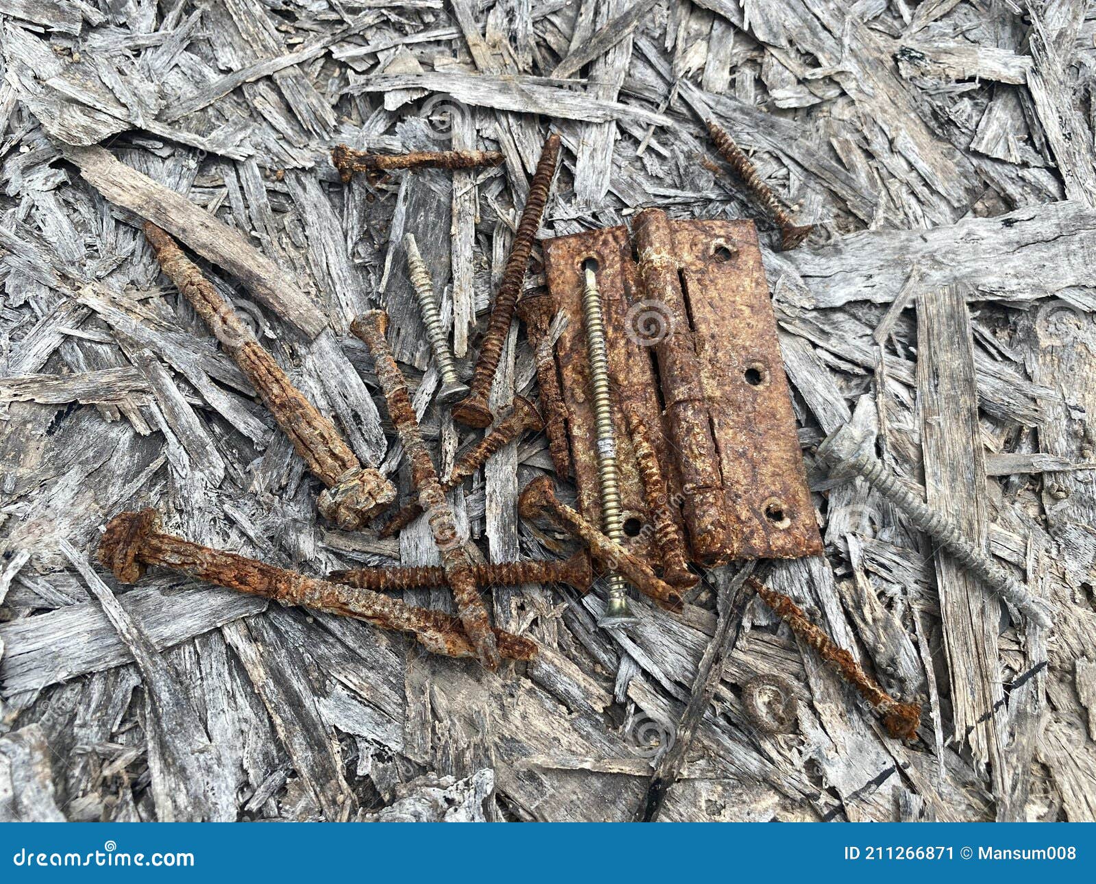 Rusty nut on wooden floor stock image. Image of wooden - 211266871