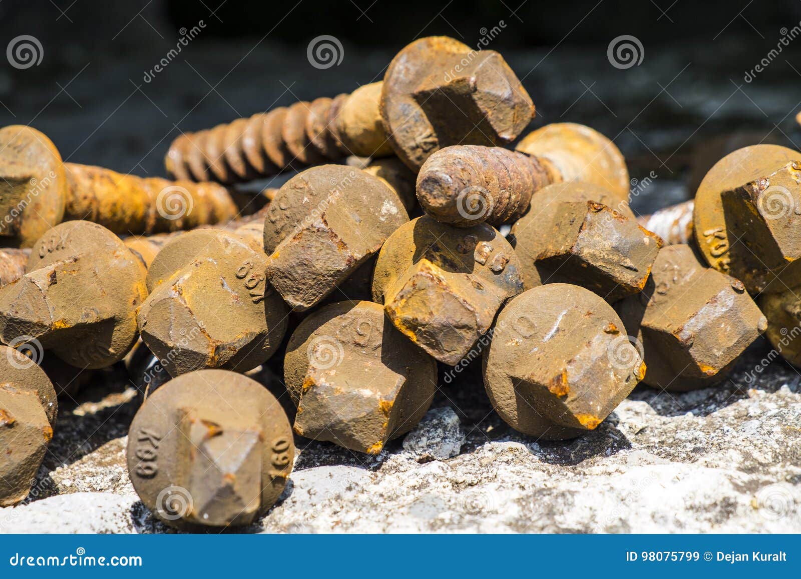 Rusty nuts and bolts stock image. Image of industrial - 98075799