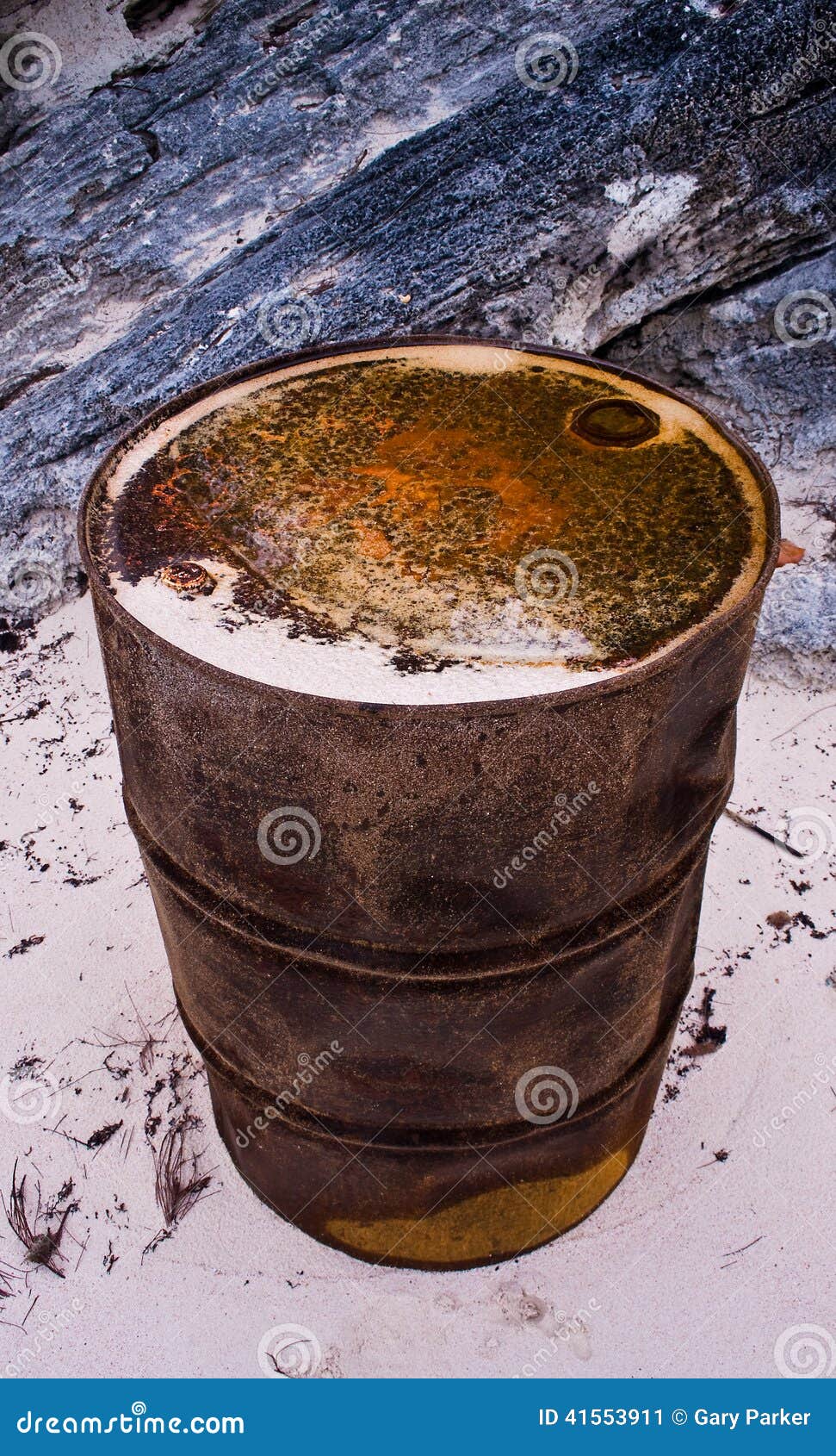 Rusty Oil Drum on a Beach stock image. Image of tank - 41553911