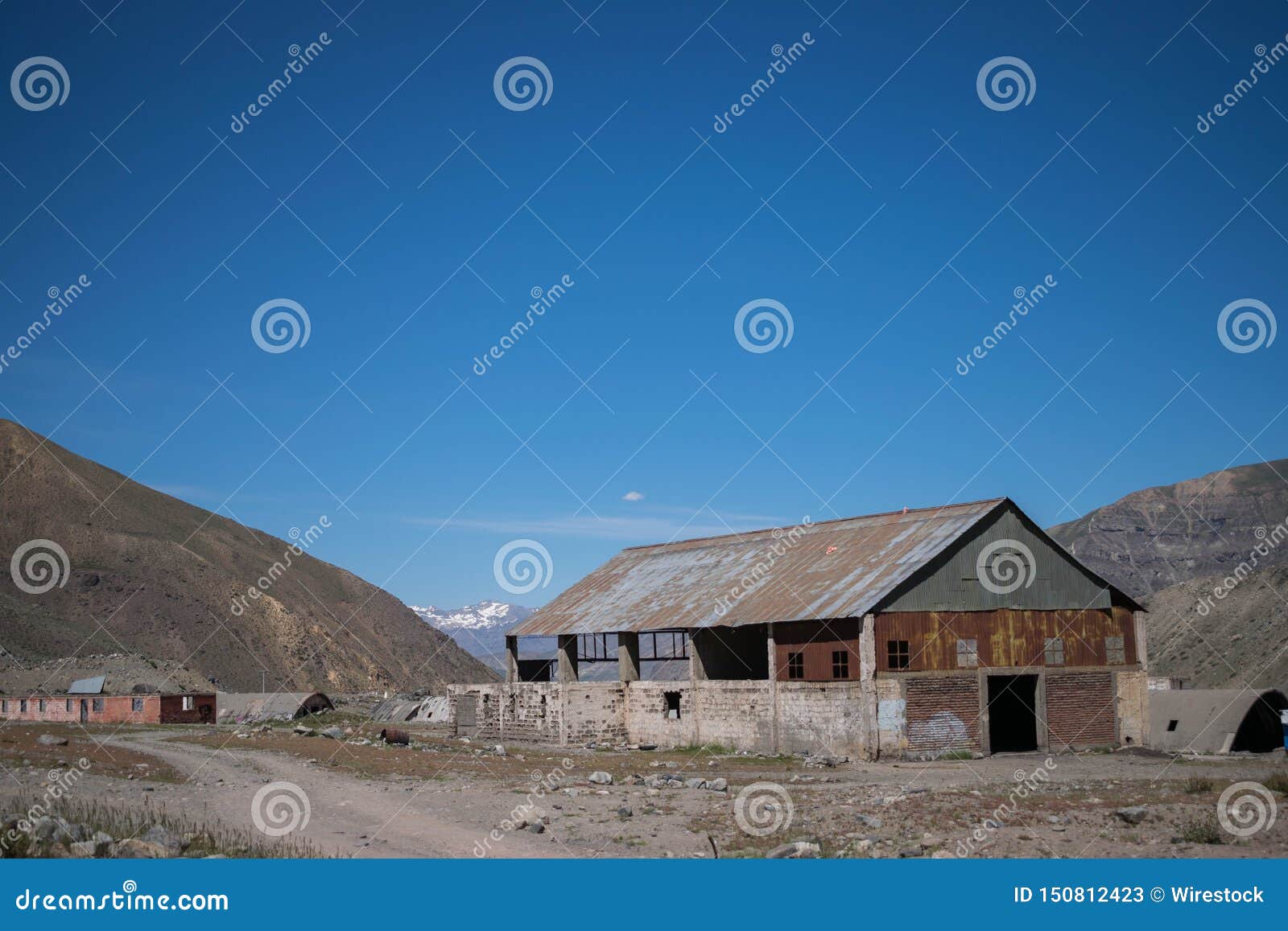 Rusty Old Abandoned Meat Factory in a Large Desert Area Stock Image ...