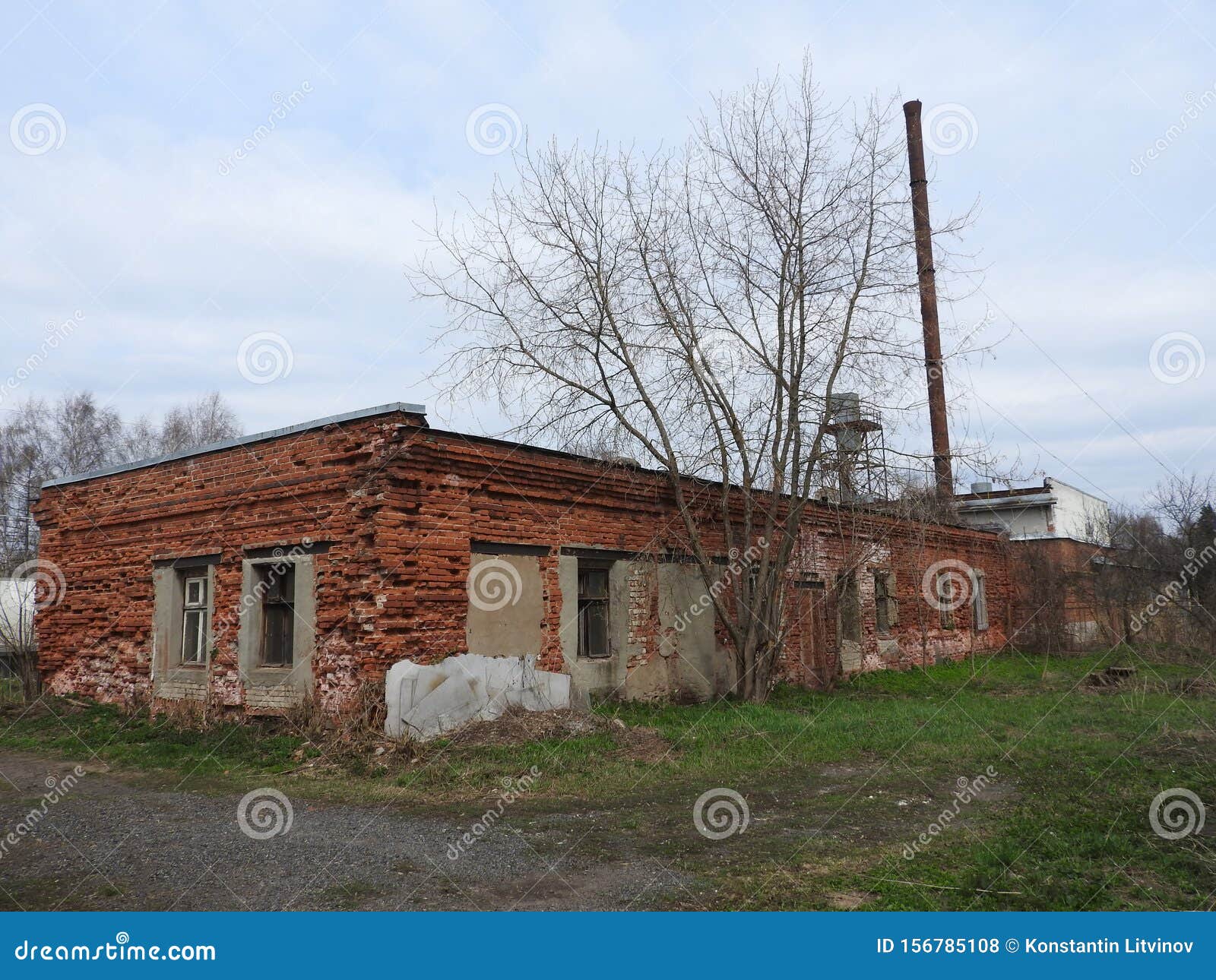Rusty Old Buildings, a Crane and a Pole Repair Work at Russia Stock ...