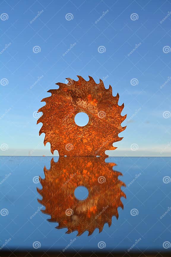 Rusty Old Circuliar Saw Disc with Reflection on Mirror Stock Image ...