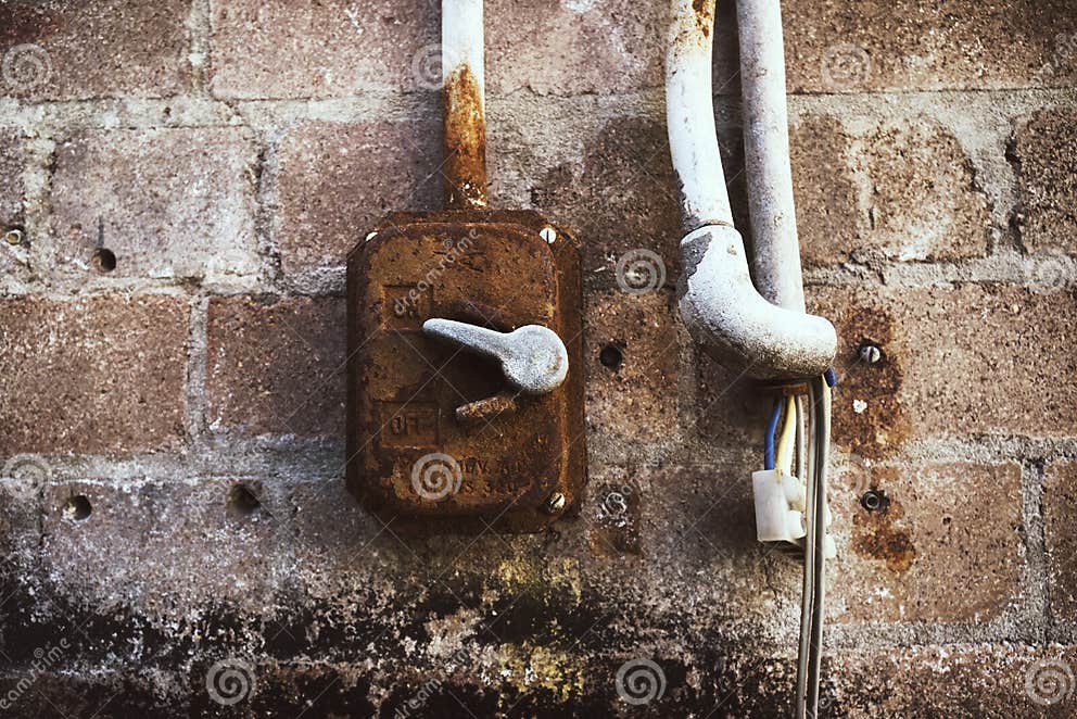 Rusty Old Electric Switch Bare Cables Brickwall Stock Image - Image of ...