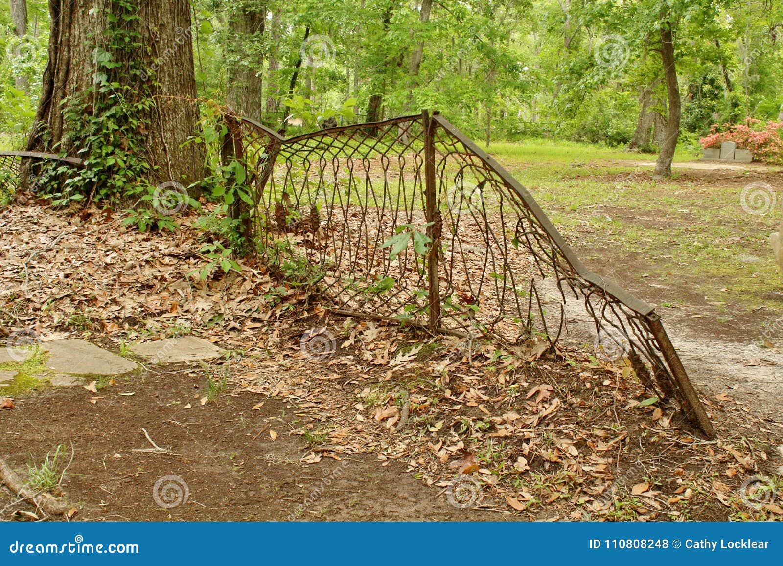 Old Fence Falling Down in a Park Stock Photo - Image of rusty, yard ...