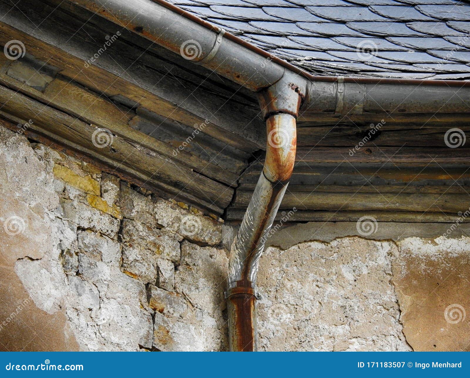 Rusty Old Gutter in Front of an Old Facade Stock Image - Image of ...
