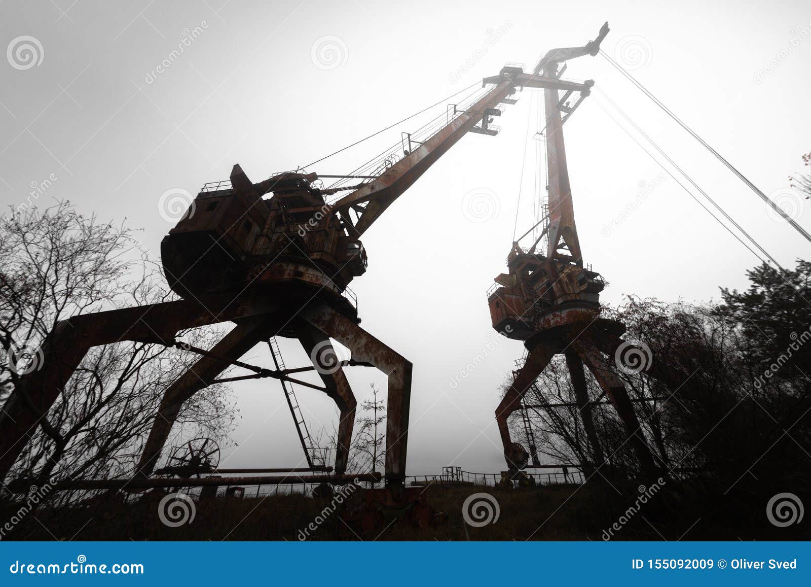 Rusty Old Industrial Dock Cranes at the Dock Stock Image - Image of ...