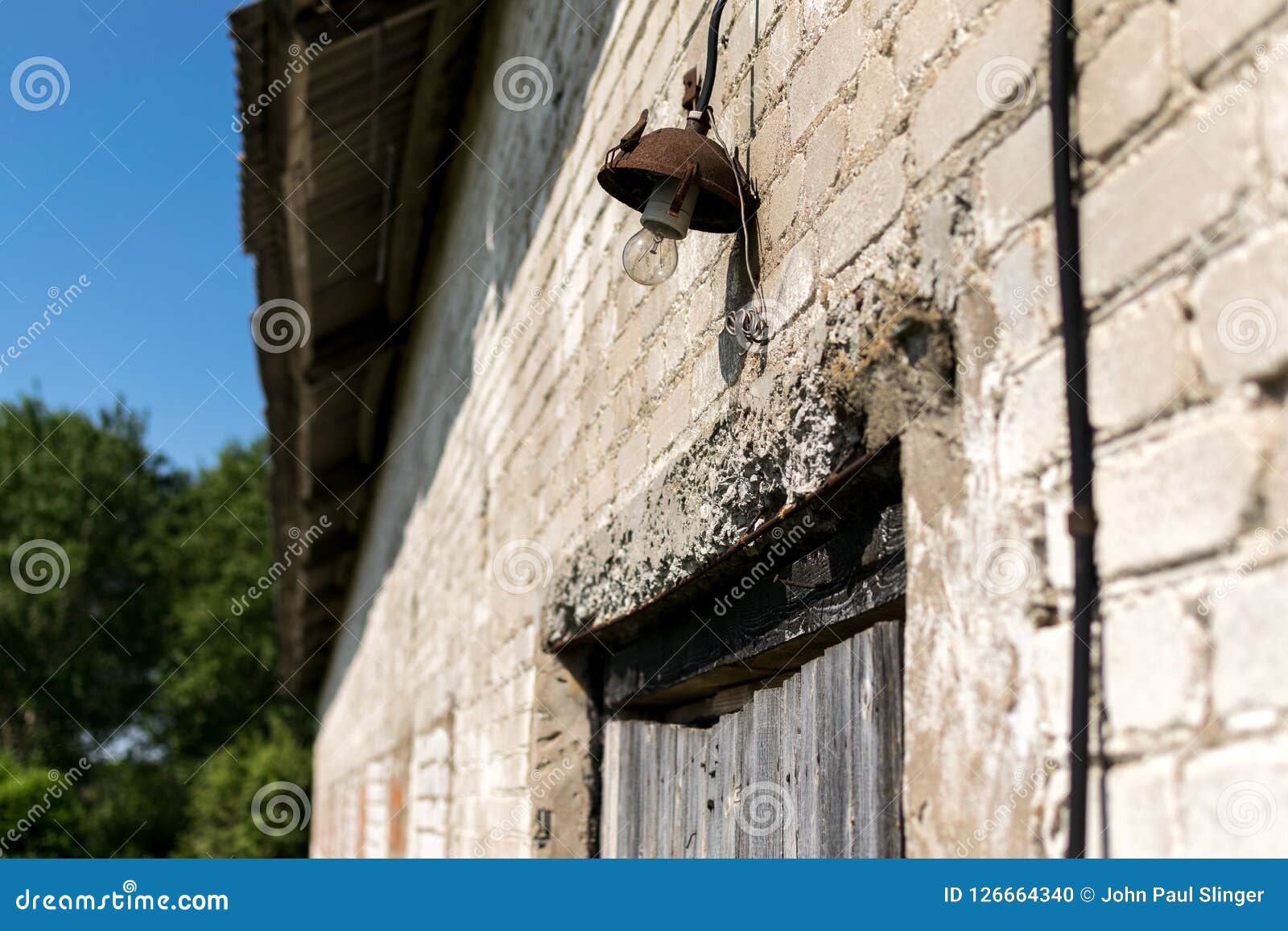 Rusty Old Light Over a Door Stock Photo - Image of ramshackle, haggered ...