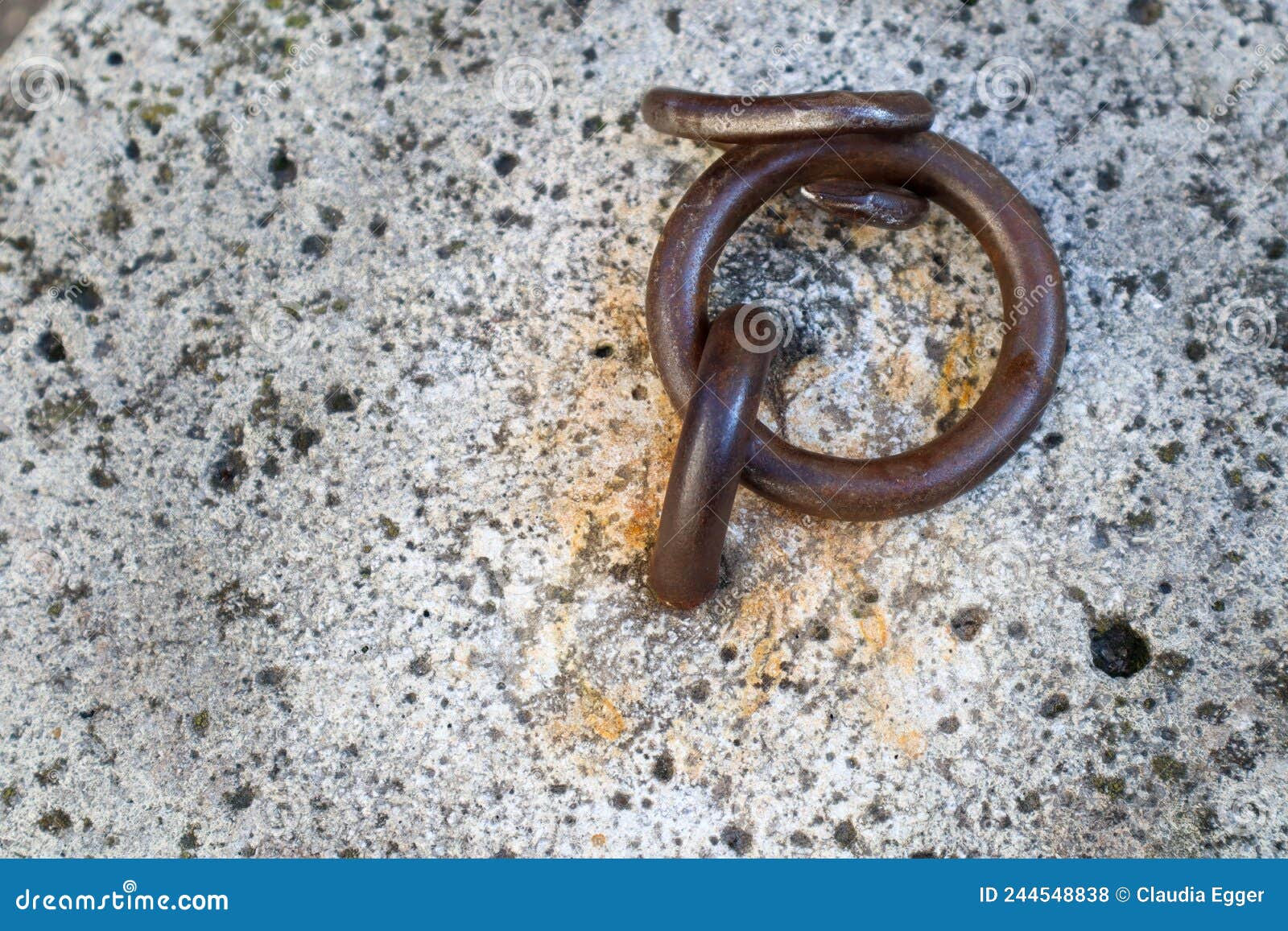 A Rusty Old Metal Ring Concreted in a Wall Stock Photo - Image of ...