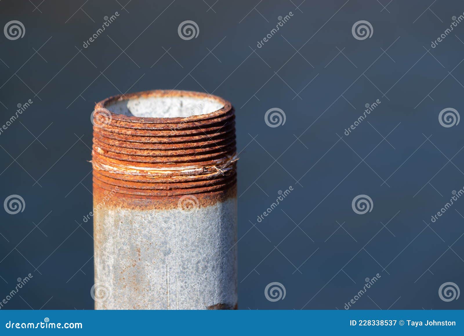 Rusty Old Pipe Sticking Out the Side of a Board Walk Stock Image ...