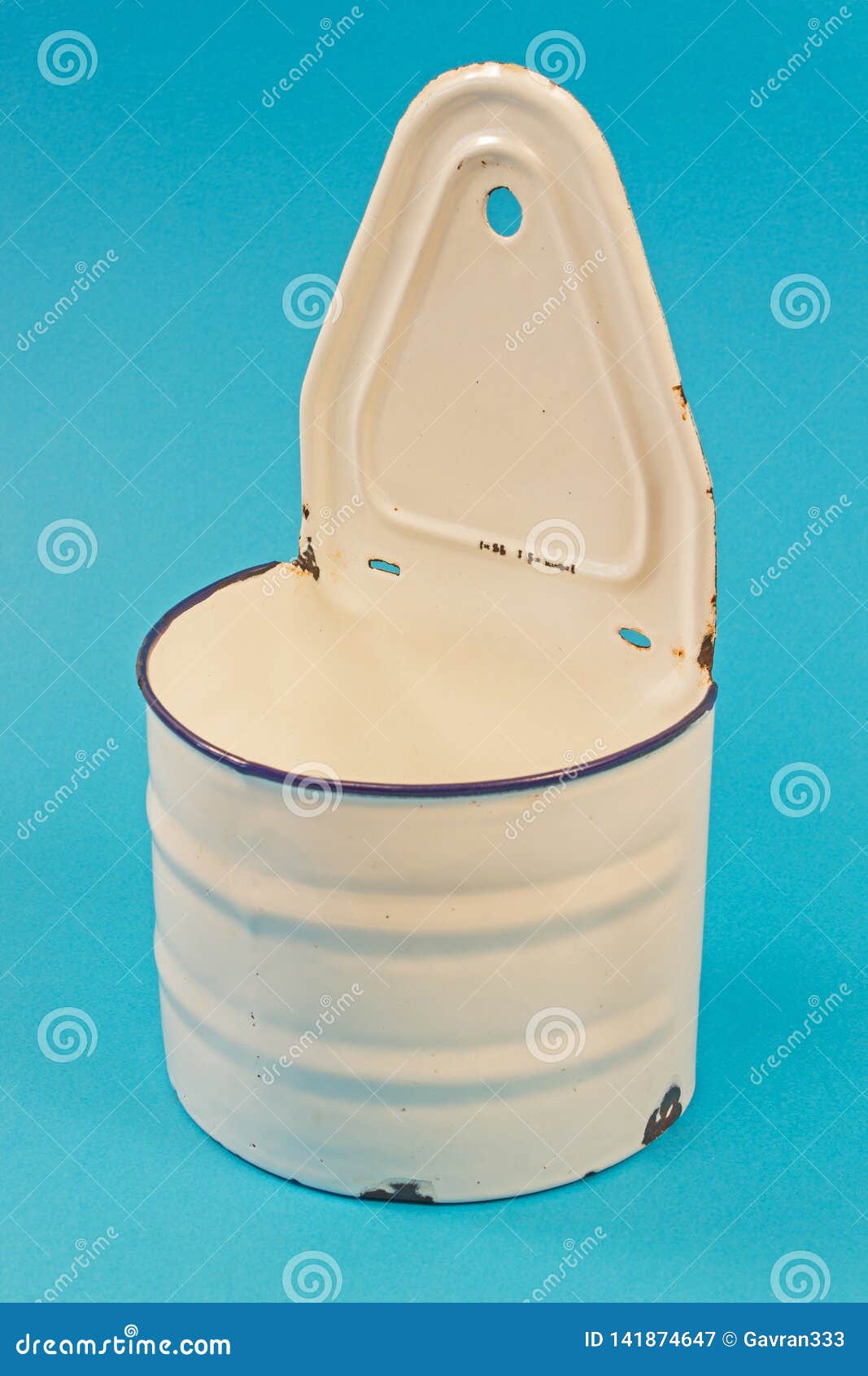 Rusty Old Salt Container for Wall Isolated on Blue Stock Image - Image ...