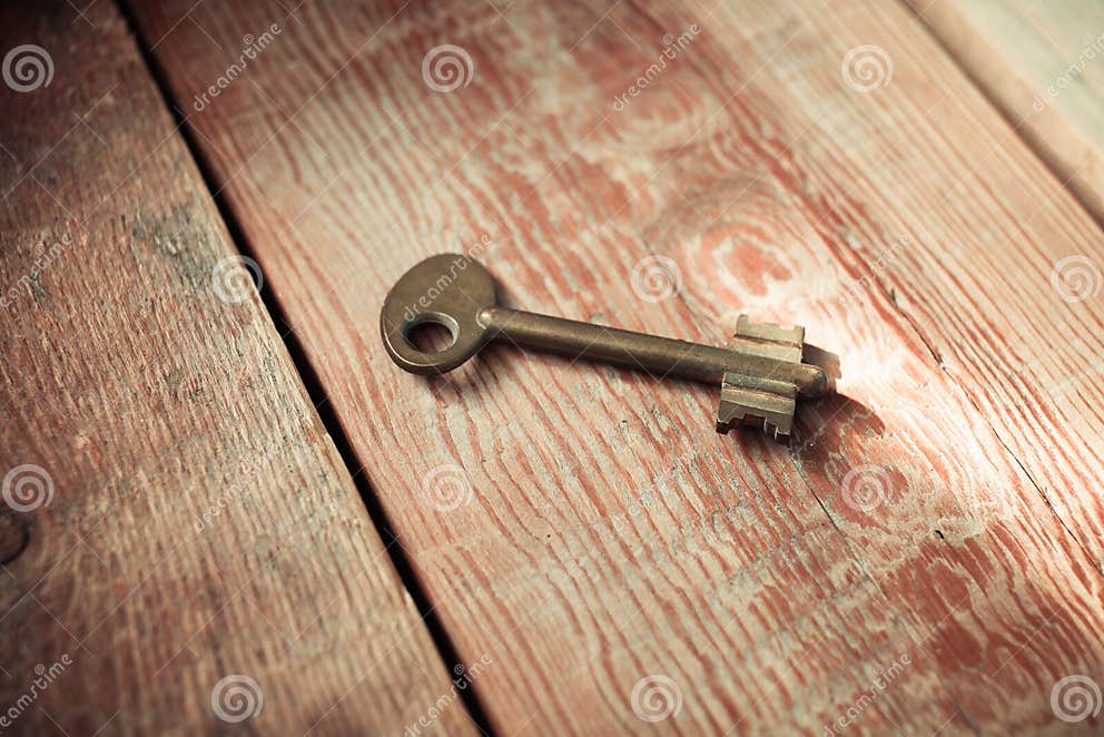 Rusty Old Skeleton Key on Dark Rustic Barnwood Stock Image - Image of ...