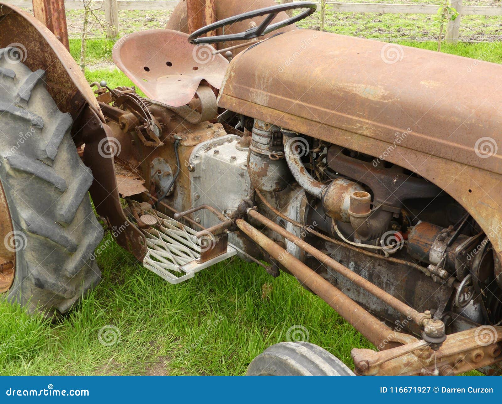 A Rusty Old Tractor Sitting in a Grass Area in England Stock Image ...
