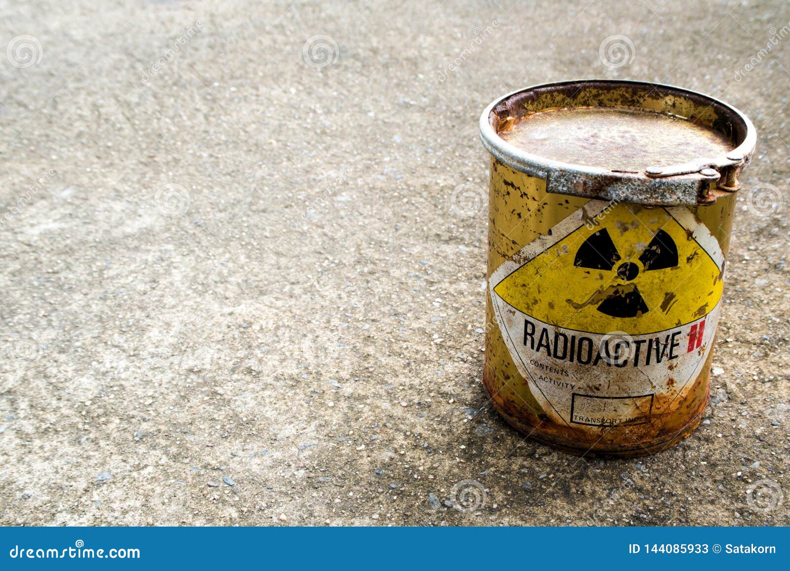 Rusty Package of Radioactive Material Container on the Rough Concrete ...