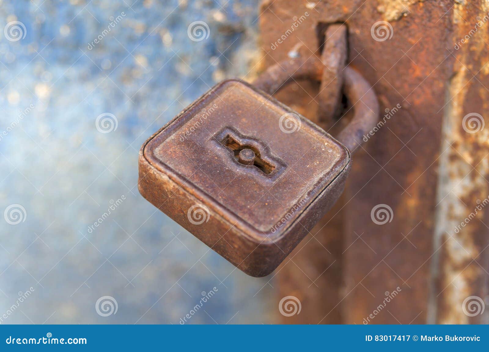 Rusty Padlock on the Old Metal Door Stock Image - Image of close ...