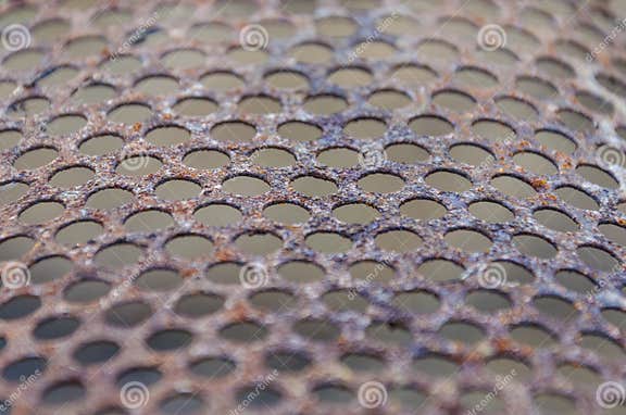 Rusty perforated sheet stock image. Image of texture - 49707913