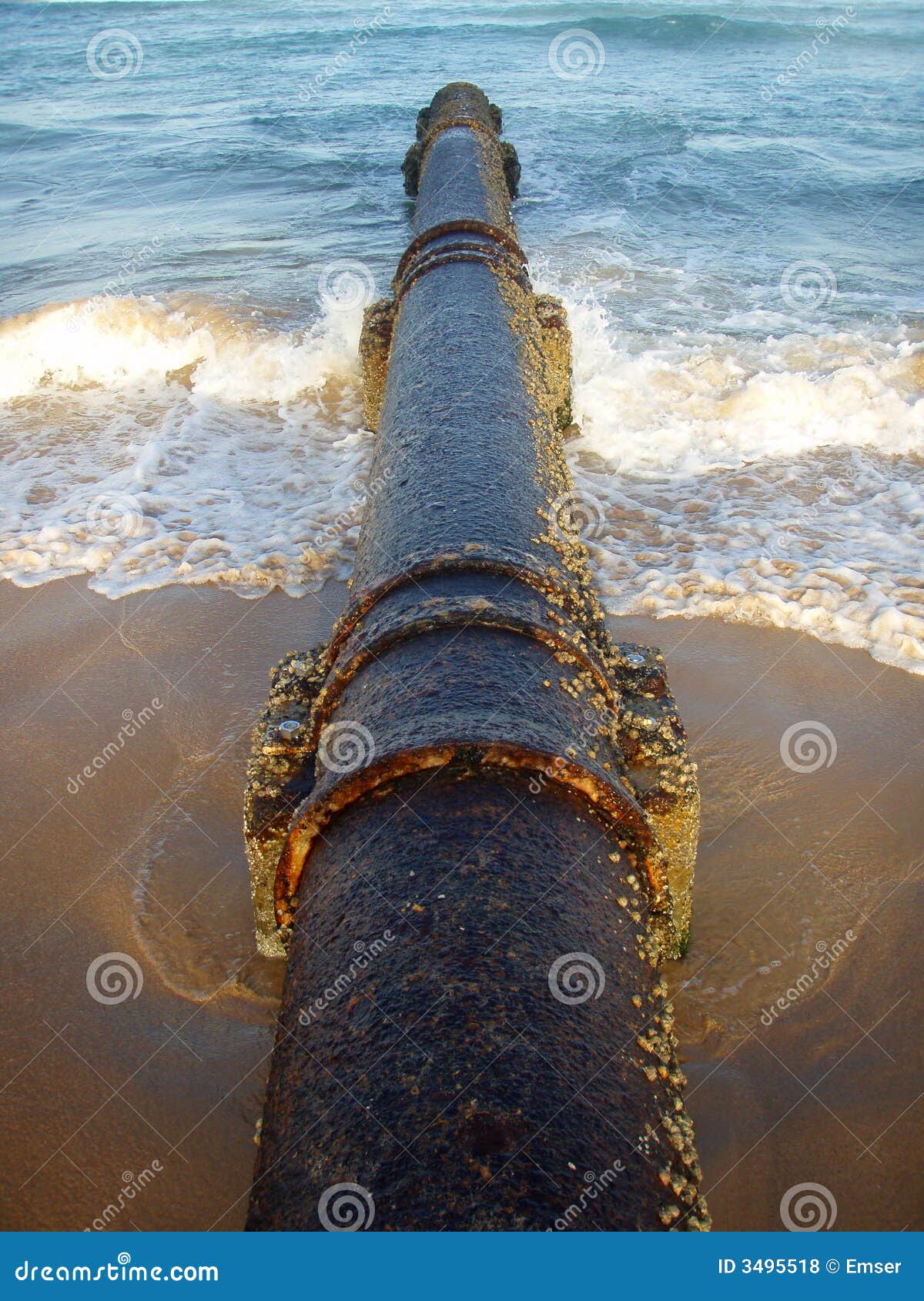 Rusty pipe on beach stock photo. Image of water, rust - 3495518