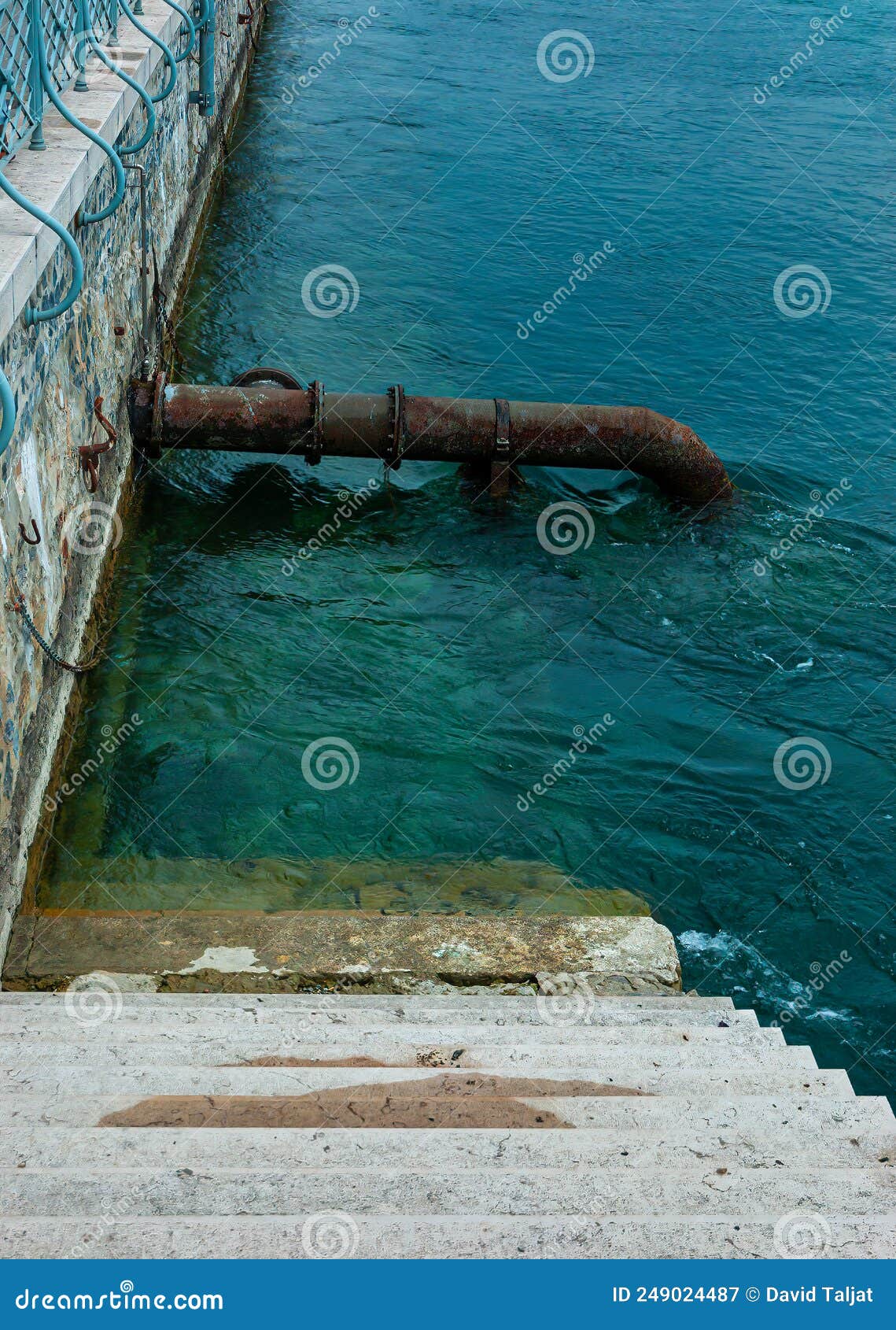 Rusty pipe in the river stock image. Image of nature - 249024487