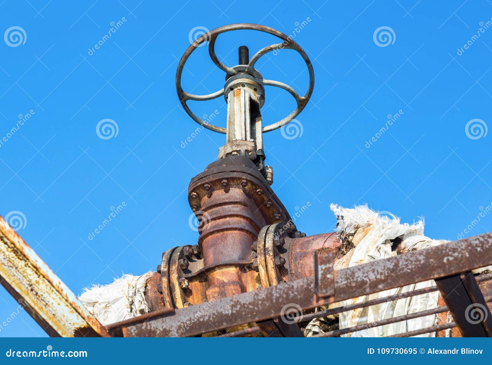 Rusty Pipeline with Valves Against the Blue Sky Background Stock Image ...