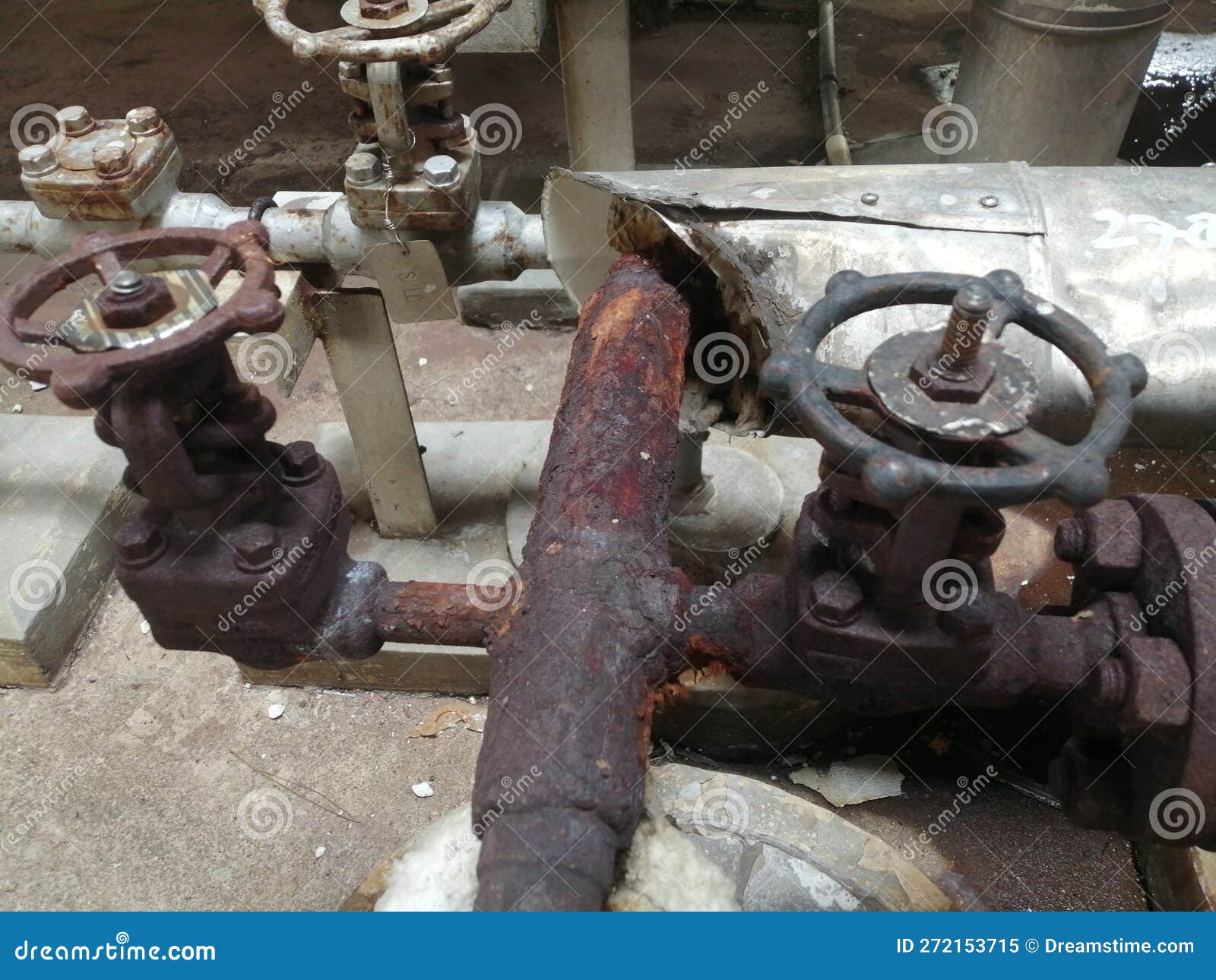 Rusty pipes and valves stock image. Image of industry - 272153715
