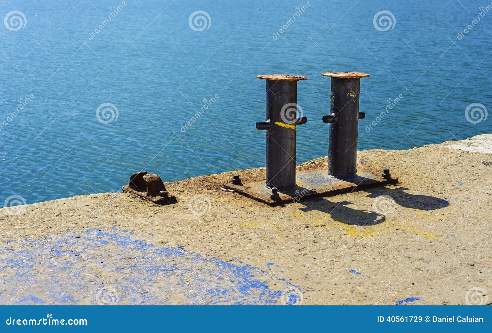 Rusty pylons in harbor stock image. Image of metallic - 40561729
