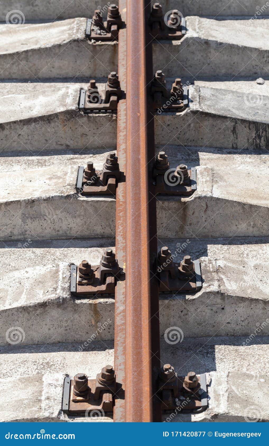 Rusty Rail on Concrete Sleepers. Vertical Photo Stock Image - Image of ...