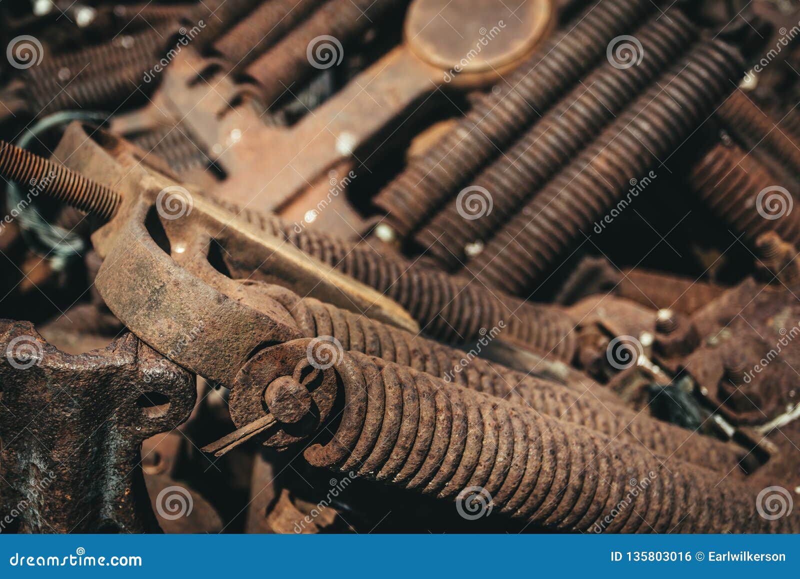 Rusty Railroad Car Spring Assemblies Laying in a Pile on the Ground ...