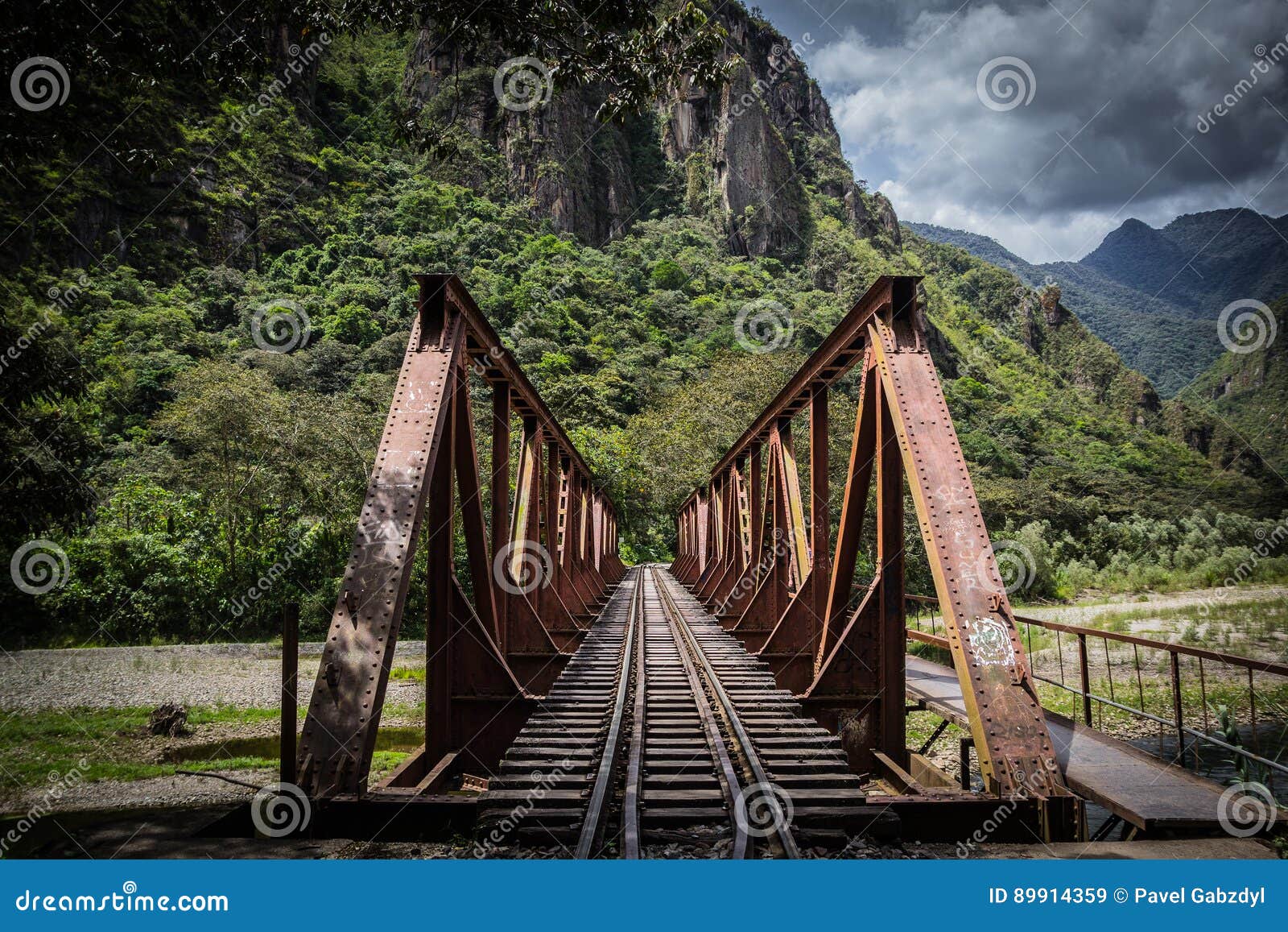 Rusty Railway Bridge Over the River with Mountains Surrounding Stock ...