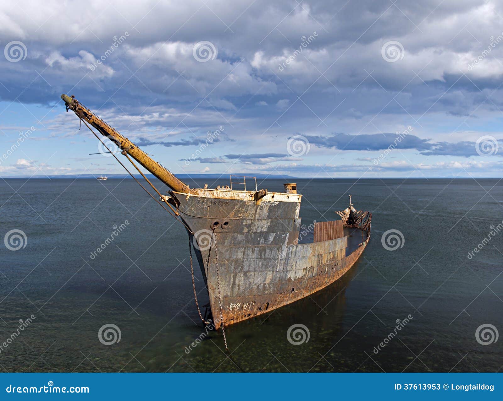 Rusty Grounded Ship Wreck Laying On Shallow Water In Campana River ...
