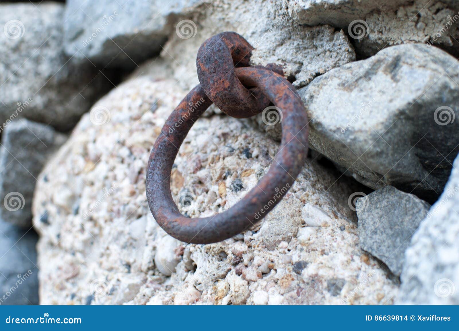 Rusty ring on stone wall stock photo. Image of ring, rusty - 86639814