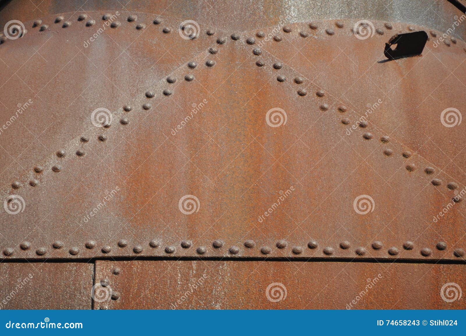 Rusty riveted steel plates stock image. Image of industry - 74658243